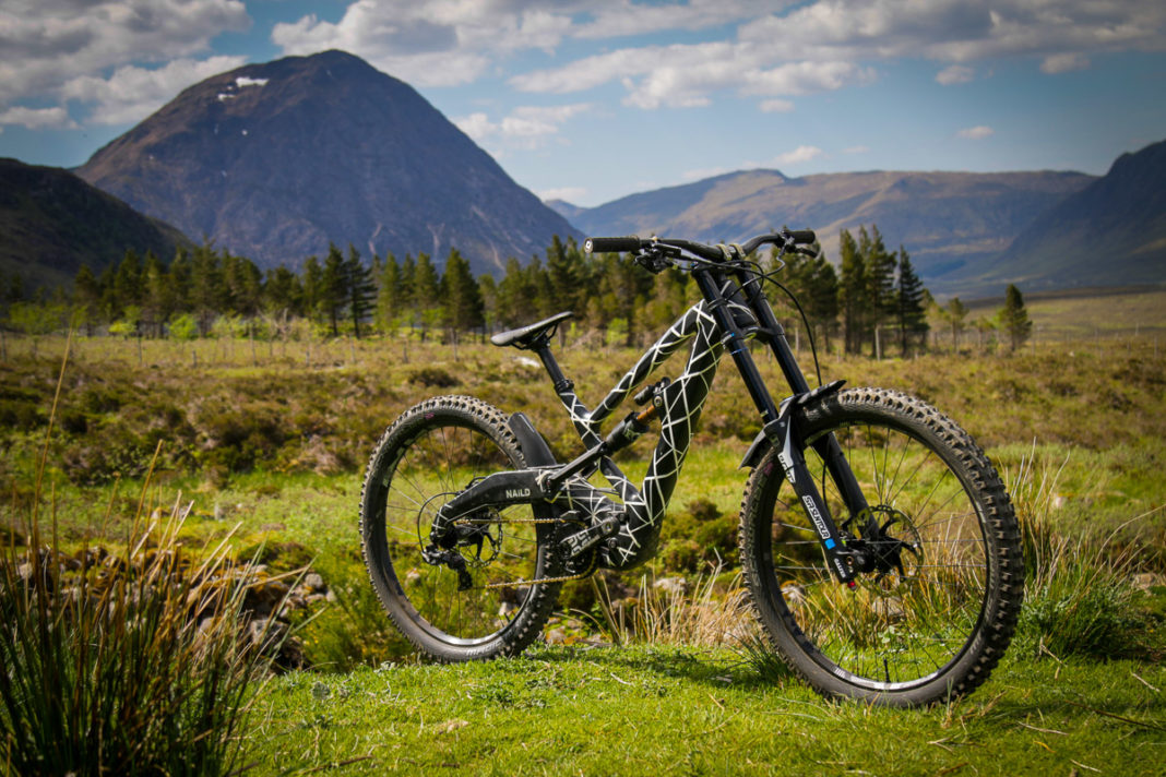 Polygon XQUARONE DH glides over anything with 218mm of pedal-able ...