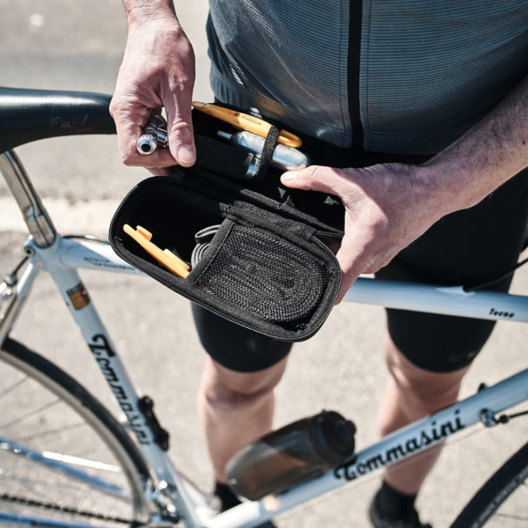 Fidlock Toolbox offers a magnetic quick-connect storage option for bike tools, phone & more ...