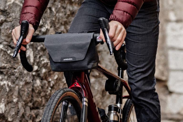 Apidura City Handlebar Pack snaps on quick-release bar bag - Bikerumor