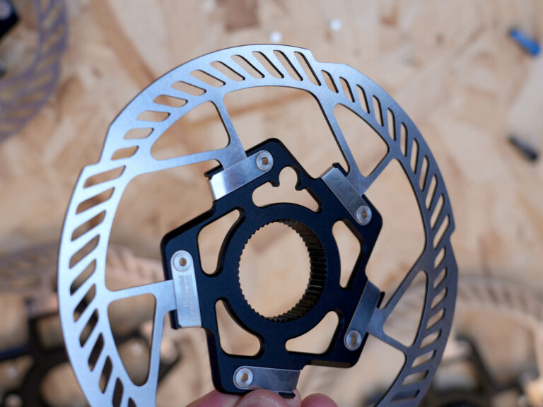 Zeno's ReactionEX Floating Brake Rotor uses Tiny Leaf Springs - Bikerumor